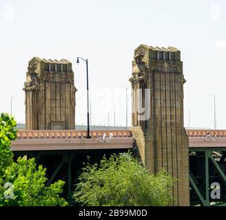 Ohio, Cleveland. The Hope Memorial Bridge. Huge Art Deco statues called ...
