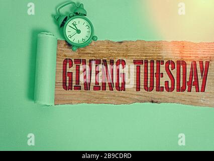 Handwriting text writing Giving Tuesday. Conceptual photo international ...