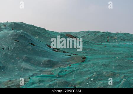 green dustproof mesh in a construction site Stock Photo - Alamy