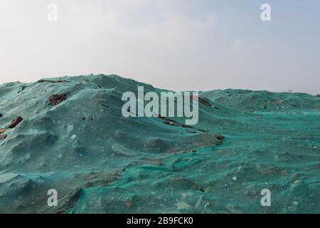 green dustproof mesh in a construction site Stock Photo - Alamy