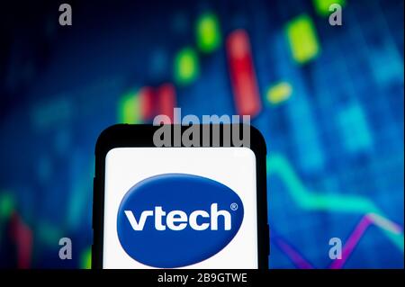 In this photo illustration a Vtech logo seen displayed on a smartphone ...