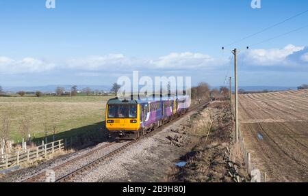 Former Northern rail class 142pacer trains 142060 + 142028 passing Hill ...