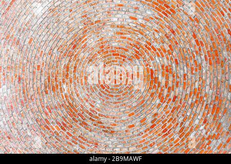 Radial red brick wall texture pattern Stock Photo - Alamy
