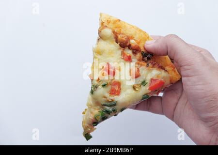 hand holding slice pizza isolate on white background Stock Photo - Alamy