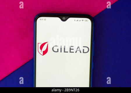 In this photo illustration, a Gilead Sciences logo is seen displayed on ...