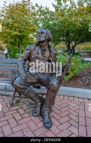 George Washington statue on a bench at George Washington University ...