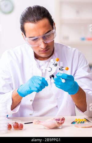Young nutrition expert testing food products in lab Stock Photo - Alamy