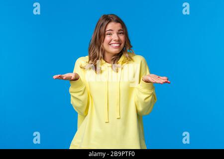 Oops sorry, no big deal. Carefree cute unbothered young blond girl ...