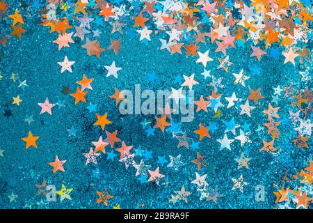 blue sparkles and multicolour stars background Stock Photo - Alamy
