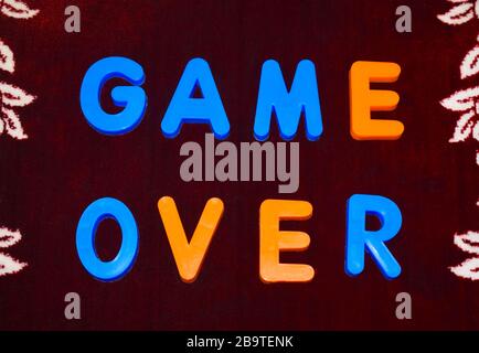 Game over word written with different colored letter blocks arranged on ...