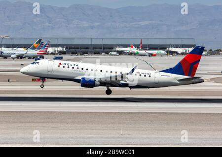 Delta Connection Embraer ERJ-175 above runway threshold. Airplane E175 ...