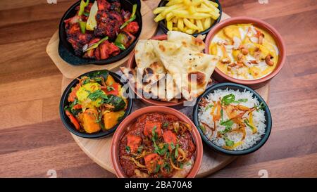 Indian style tapas curry selection which made with chicken, lamb ...