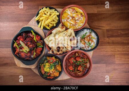 Indian style tapas curry selection which made with chicken, lamb ...