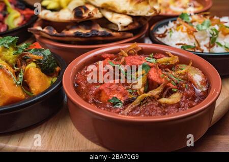 Indian style tapas curry selection which made with chicken, lamb ...