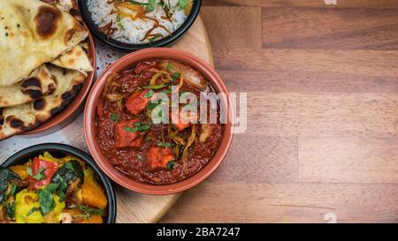 Indian style tapas curry selection which made with chicken, lamb ...