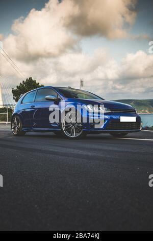 Blue business class hatchback commercial Stock Photo - Alamy