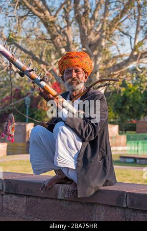 INDIA RAJASTHAN Mandore Garden. Musician playing a traditional ...