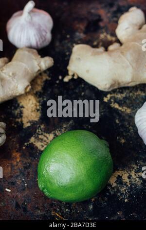 Citrus fruits with garlic and ginger root Stock Photo - Alamy