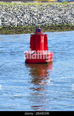Floating buoy as a signal for passing ships Stock Photo - Alamy