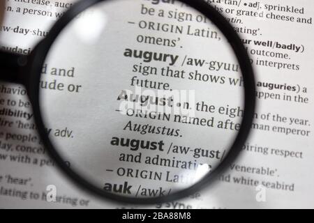 The word of phrase august in a dictionary Stock Photo - Alamy