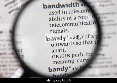The word or phrase bandy in a dictionary Stock Photo - Alamy