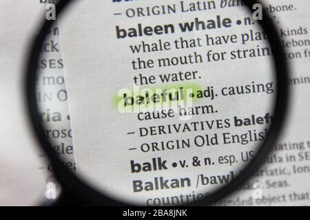 baleful word in a dictionary. baleful concept Stock Photo - Alamy