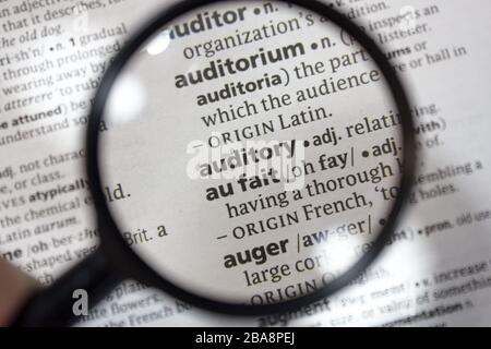 The word of phrase auditory in a dictionary Stock Photo - Alamy