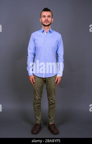 Full body shot of handsome Turkish man Stock Photo - Alamy