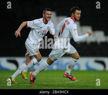 Milton Keynes Dons' Dean Bowditch (right) scores his sides opening goal ...