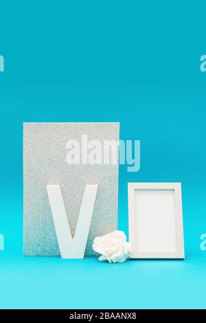 Shiny grey frame for text with details and decorations on a blue ...