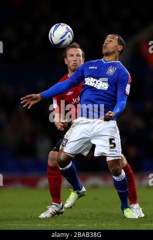 Ipswich Town's Carlos Edwards and Nottingham Forest's Joel Lynch battle ...