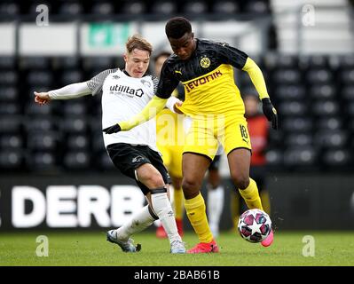Derby County's Liam Thompson (left) and Norwich City's Marcelino Nunez ...