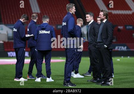 Derby County players inspect the pitch ahead of the Sky Bet ...