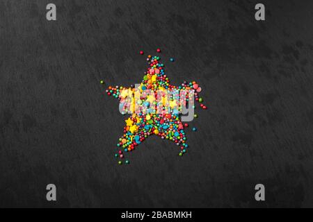 Sprinkle star shape background. Sprinkle in the form of stripes, balls ...