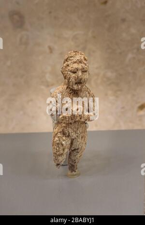 Exhibit in Museum of Pre-Columbian Art, Santiago, Chile. Wooden figures ...