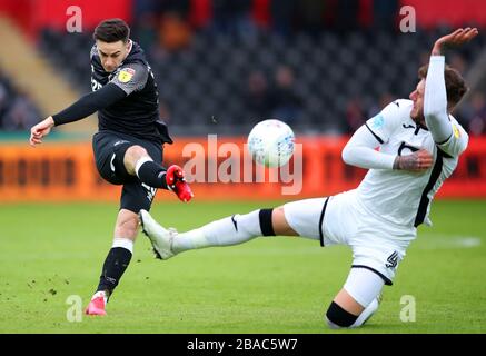 Derby County's Tom Lawrence and Swansea City's Joe Rodon battle for the ...