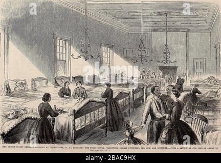 Hospital ward during the American Civil war, showing nurses, doctors ...