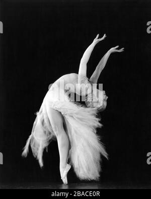 Graceful ballerina bending the back. in the dance studio shot.full ...