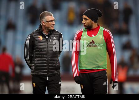 Watford manager Nigel Pearson speaks to team-mate Troy Deeney Stock ...