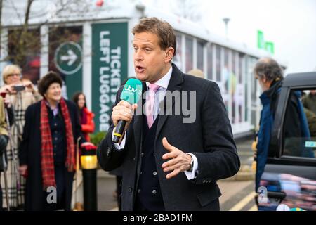 ITV's Ed Chamberlin during filming in a branded Cheltenham Festival ...