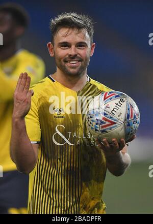 Coventry City's Matthew Godden celebrates on the pitch with his son ...
