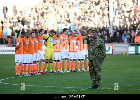Players during a minute's silence for Remembrance Sunday ahead of the ...