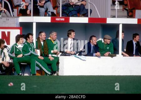 (L-R) The attention of all on the bench is firmly focussed on the match ...