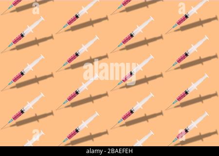 Beautiful creative pattern syringe medical on a background. Macro ...