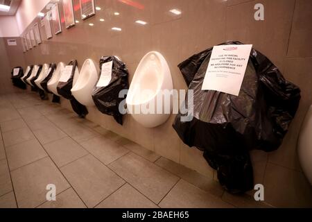 Urinals, at a motorway service station Stock Photo - Alamy