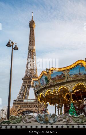 Carousel and The Eiffel Tower. Sunshine on famous landmark in Paris ...