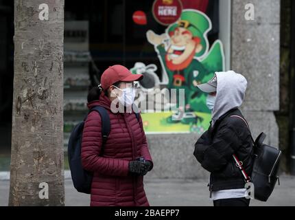 People wearing face masks to help protect against the spread of the ...