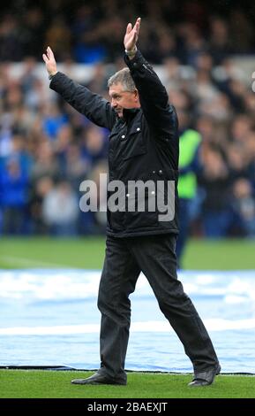 Former Everton player Kevin Sheedy (left) on the pitch ahead of the ...