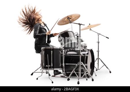 Young female drummer throwing her hair and playing drums isolated on ...