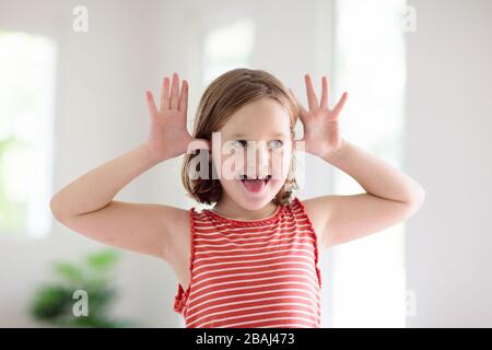 Child grimacing, kid funny face grimace close-up boy face Stock Photo ...